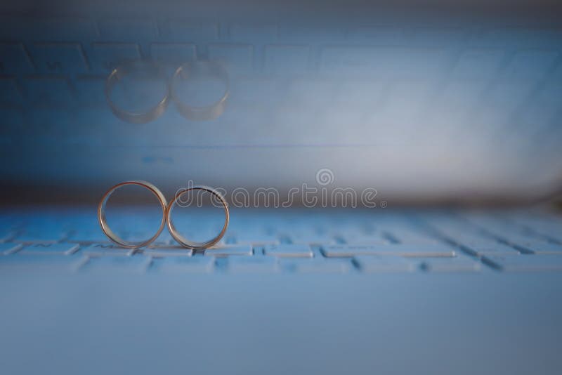 Wedding Rings on the Keyboard of Notebook Computer. Love Concept. Text ...