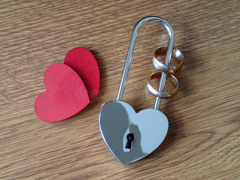 Wedding Rings in the Lock and Two Red Hearts Stock Image - Image of ...
