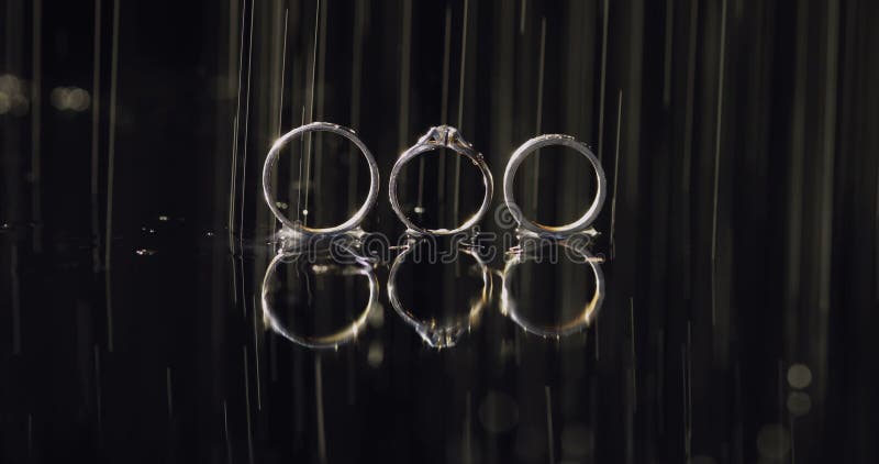 Wedding Rings Lying on Dark Surface Shining with Light Close Up Macro ...