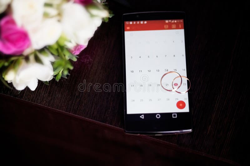 Wedding Rings on Mobile Phone Stock Photo - Image of bride, jewelry ...