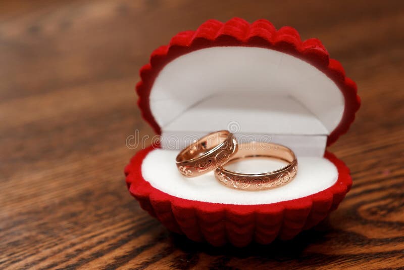 Wedding rings in red box. stock image. Image of ring - 65840751