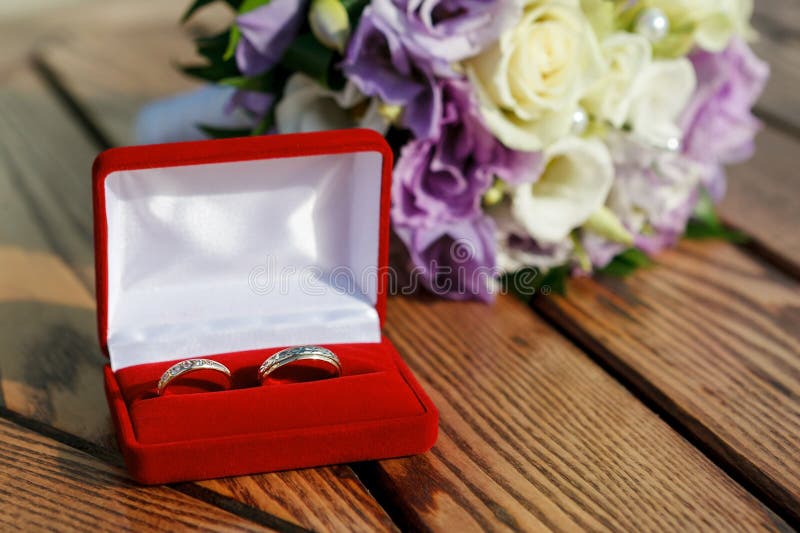 Wedding rings in red box. stock photo. Image of couple - 65840802