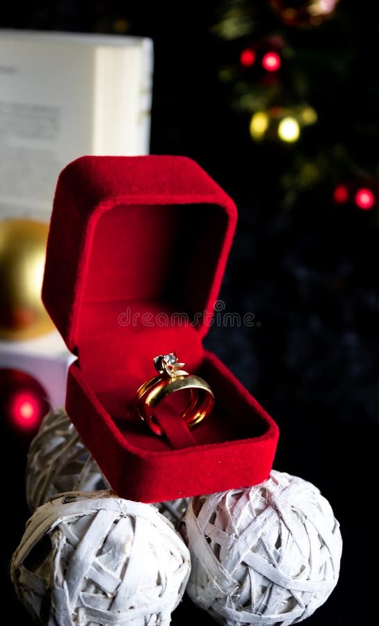 Wedding rings in red box stock photo. Image of orange - 262663368
