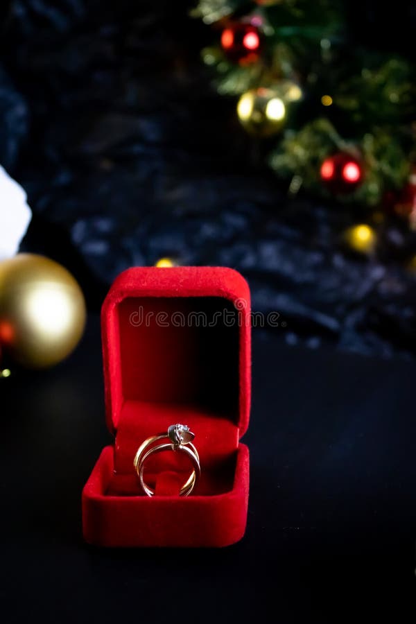 Wedding rings in red box stock image. Image of purple - 262706533