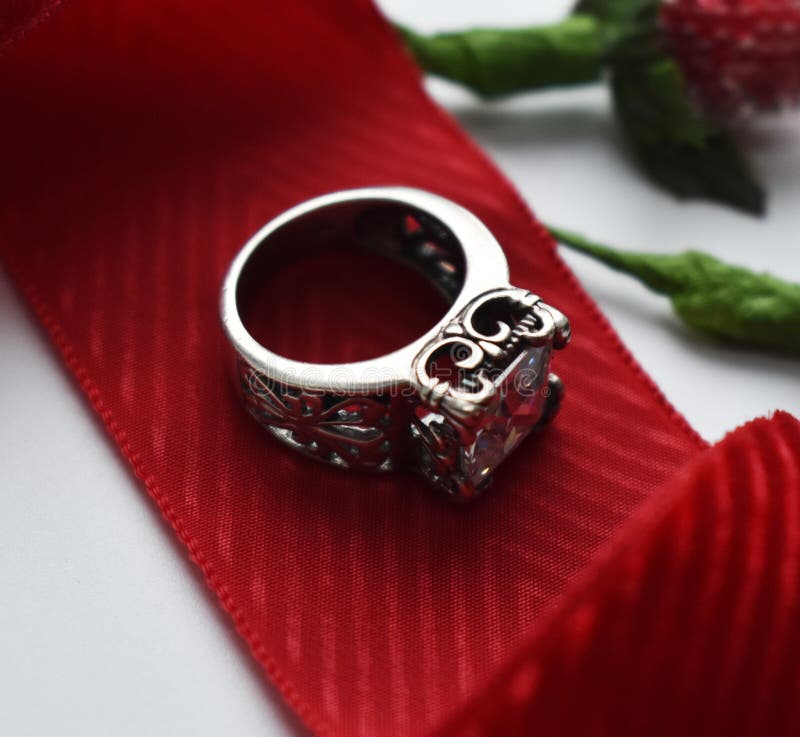 Wedding Rings with a Red Ribbon on a White Background. Stock Image ...