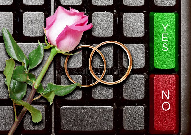 Wedding Rings and Red Roses on Computer Keyboard Stock Image - Image of ...