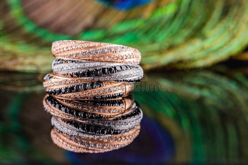 Wedding Rings are Reflected in the Mirror. a Set of Three Rings on a ...