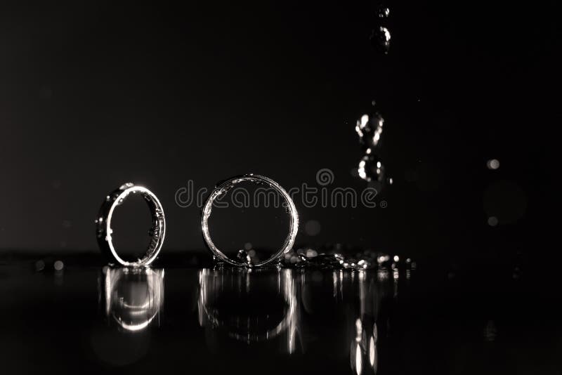 Wedding Rings Reflection in the Mirror Stock Photo - Image of wedding ...
