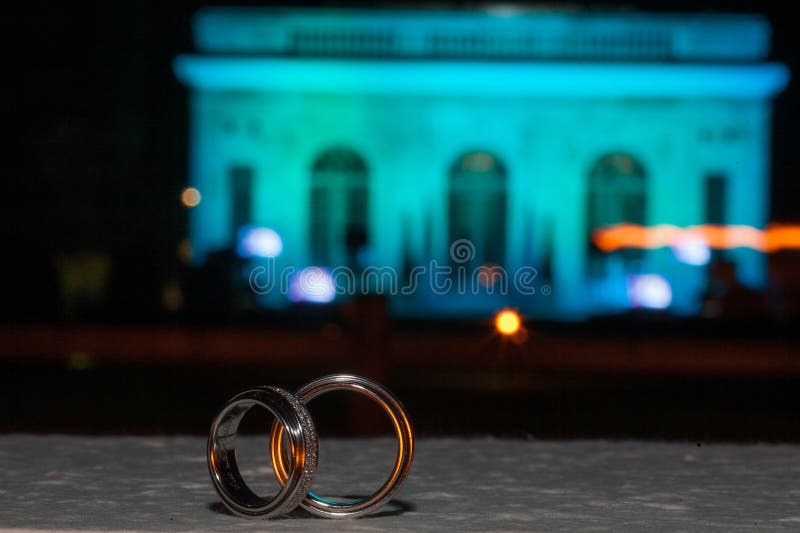 Wedding Rings and Romantic Night Lights at an Elegant Venue Stock Photo ...