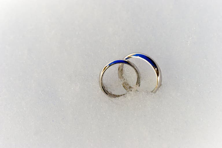 Wedding Rings in the snow stock photo. Image of snow, ring - 4973434