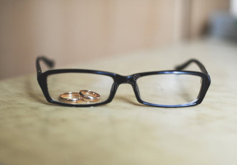 Wedding Rings and Spectacles Stock Photo - Image of bride, wedding ...