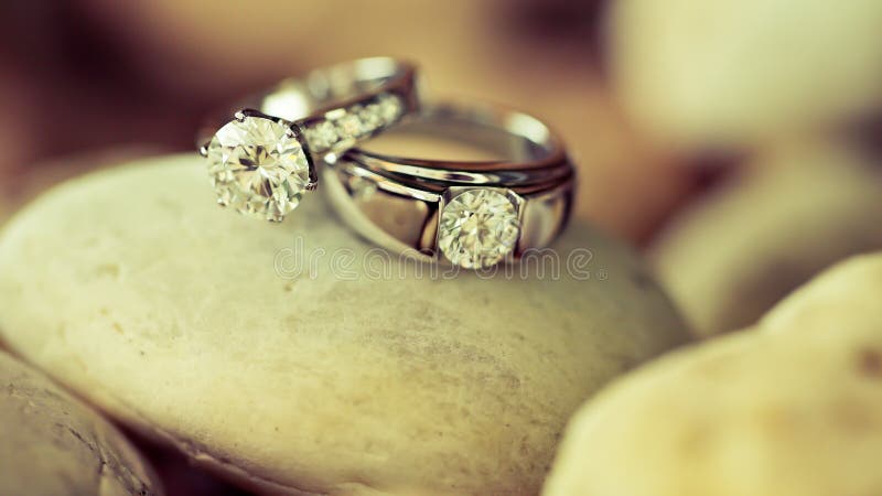Wedding rings on the stone stock image. Image of anniversary - 19342487