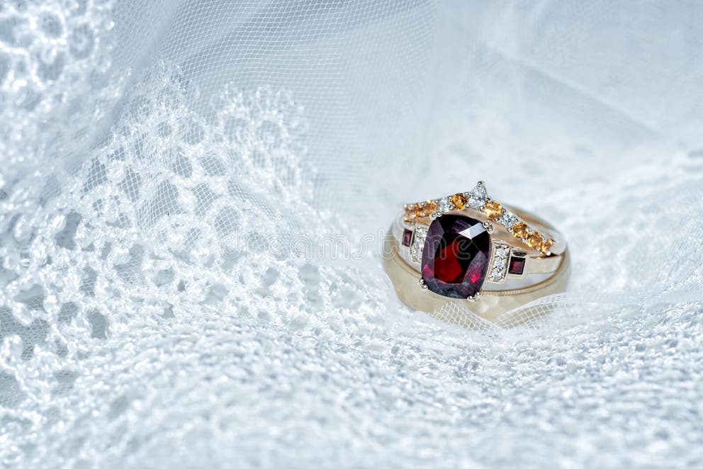 Wedding Rings on the Veil stock photo. Image of gemstone - 302117658