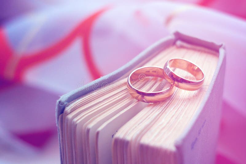 Wedding Rings with a Vintage Book Stock Photo - Image of bonding ...
