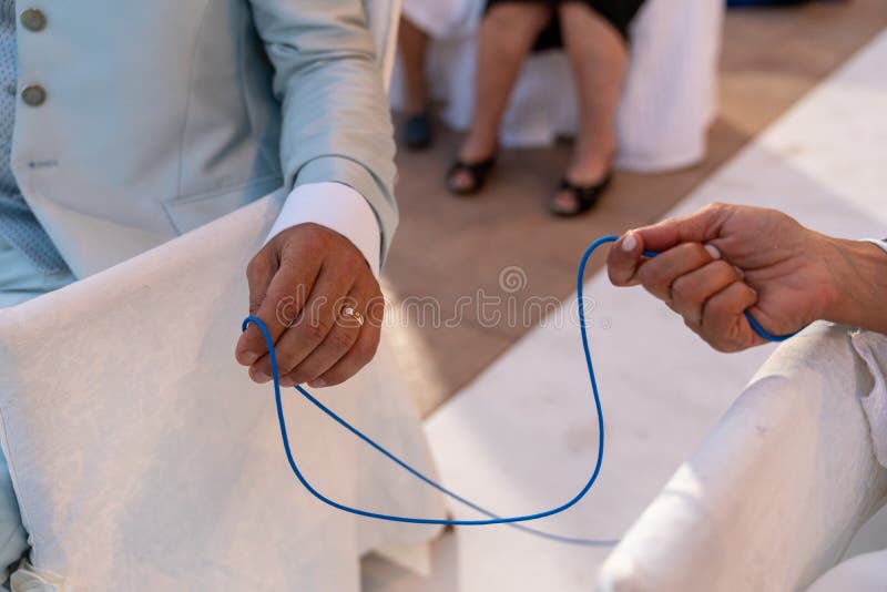 Wedding Rope Held by the Bride Stock Photo - Image of engagement ...