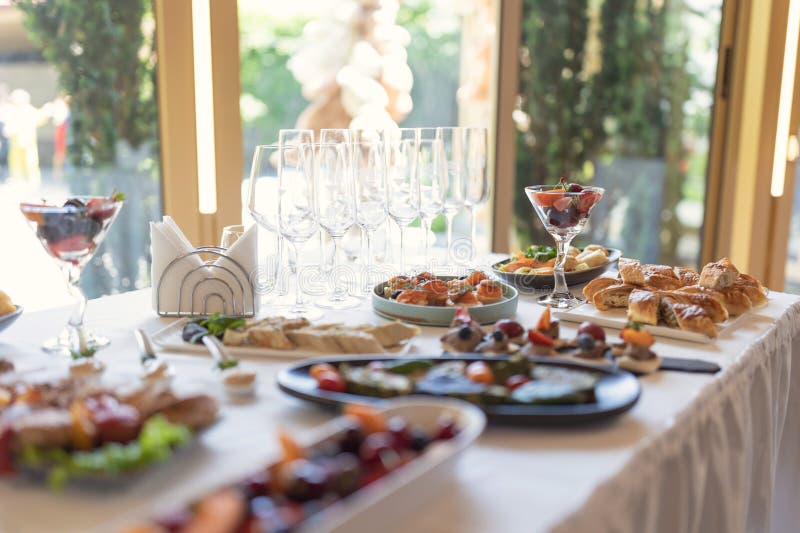 Wedding Served Banquet Table with Appetizers. Various Snacks and Drinks ...