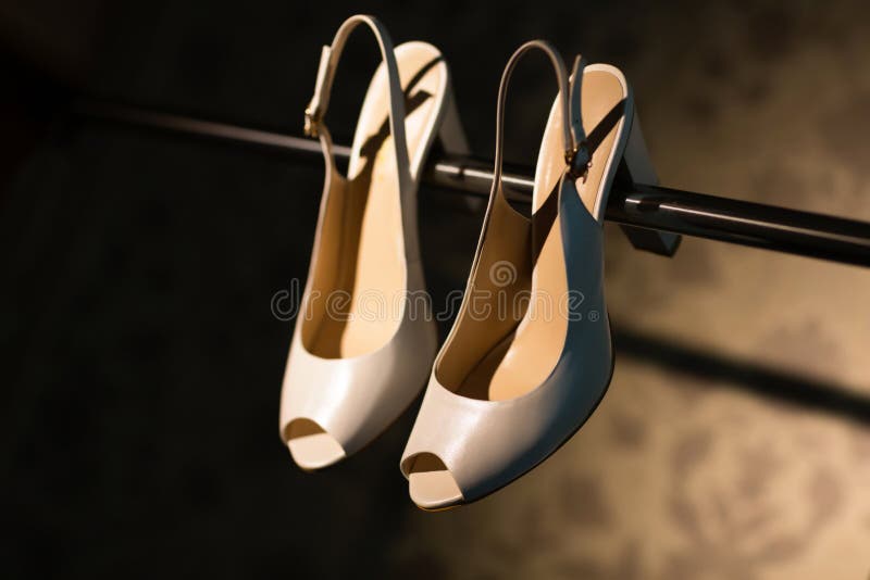 Wedding Shoes Hanging on a Metal Stick Stock Image - Image of black ...