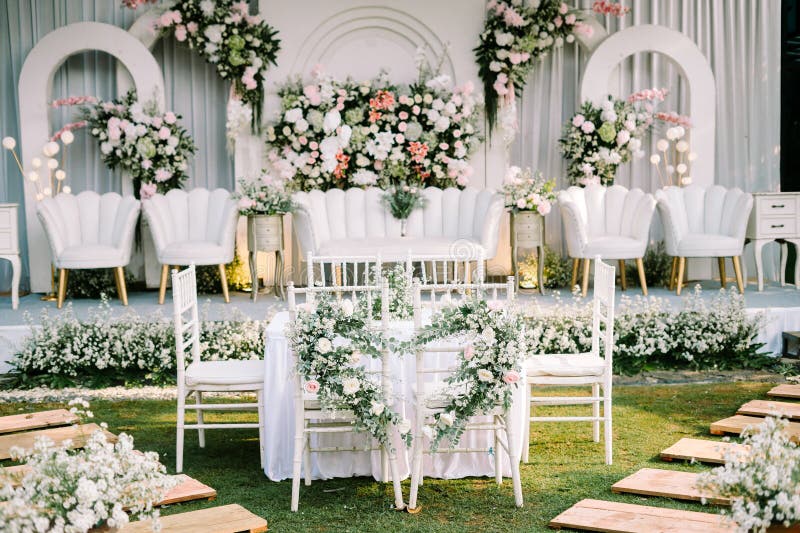 A Wedding Solemnization Table Adorned with Exquisite Floral Decorations ...