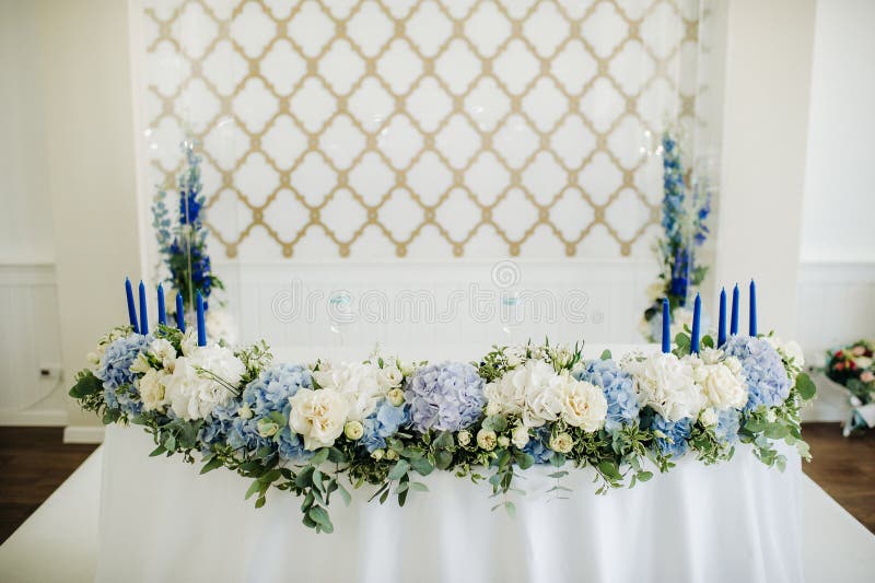 Wedding Table Decoration with Blue Flowers on the Table in the ...
