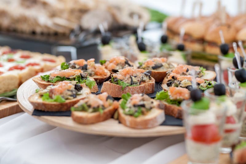 Wedding Table with Food. Snacks and Appetizer on the Table. Bread with ...