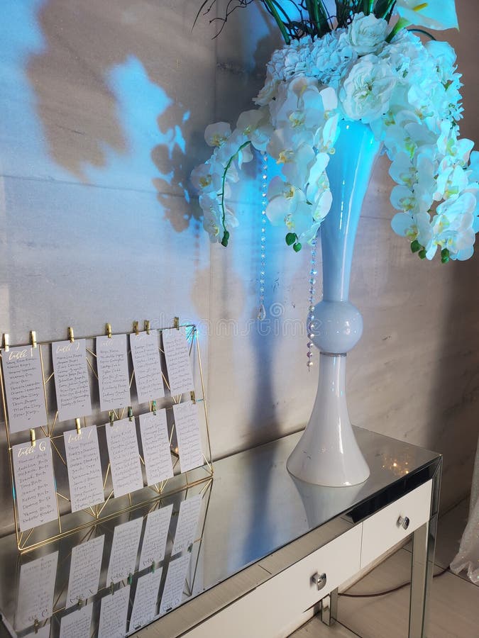 Wedding Table Seat Assignments with Floral Arrangements Stock Photo ...