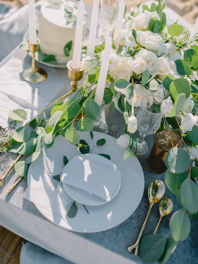 Wedding Table Setting with a Blank Card Decorated with Eucalyptus ...