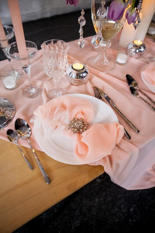 Wedding Table Setting with Tablecloths, Dishes and Decorations. Stock ...