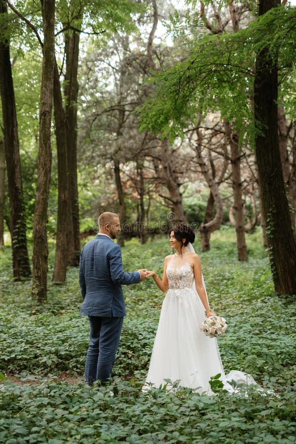 Wedding Walk of the Bride and Groom in the Deciduous Stock Image ...