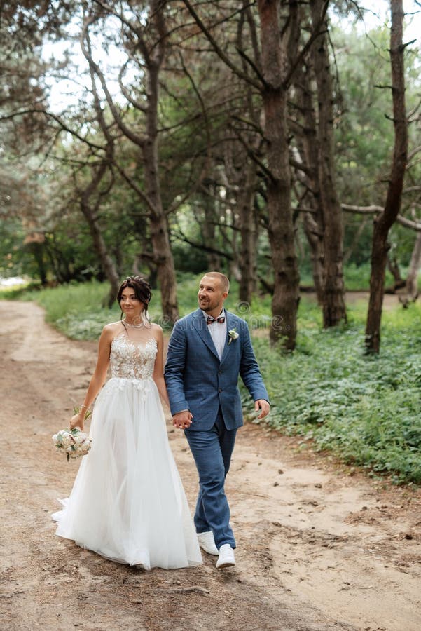 Wedding Walk of the Bride and Groom in the Deciduous Stock Photo ...