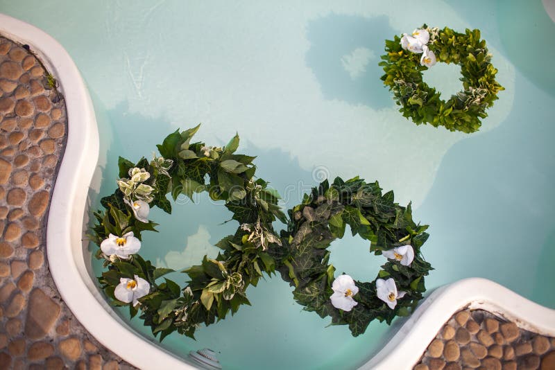 Wedding Wreaths with Orchids in the Pool Stock Image - Image of bridal ...