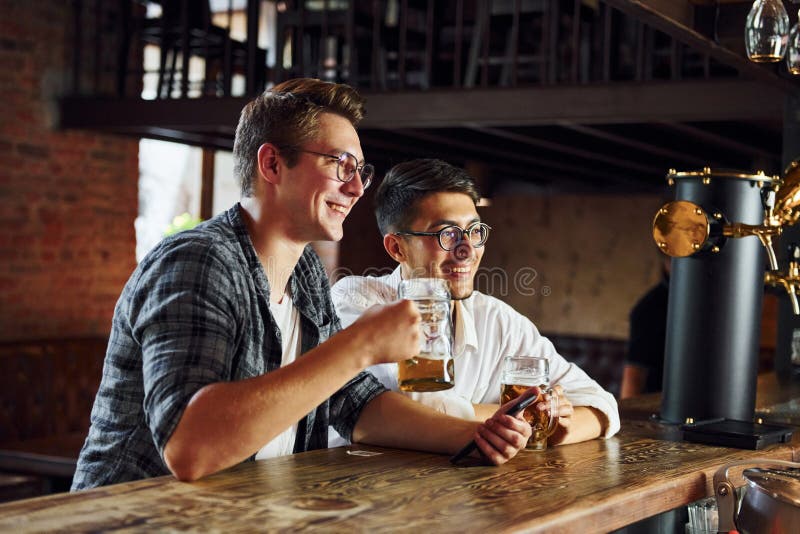 Weekend Activities. People in Casual Clothes Sitting in the Pub Stock ...