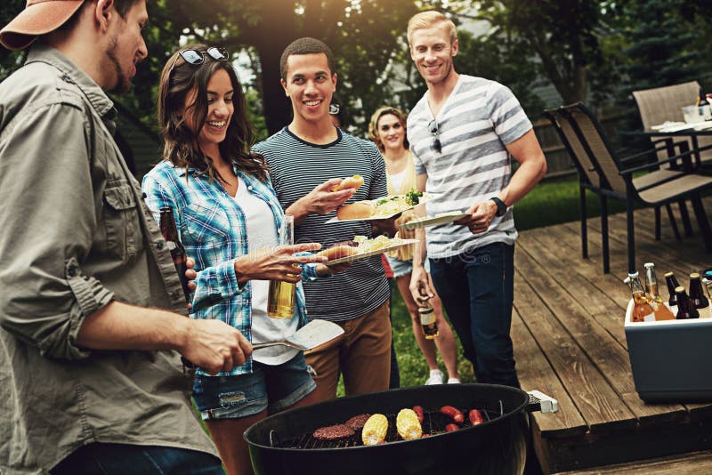 This Weekend is All about that Barbecue. a Group of Friends Having a ...
