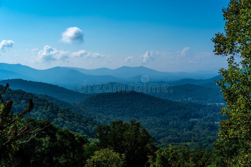 A Weekend Drive on the Parkway Stock Photo - Image of forests, sunshine ...