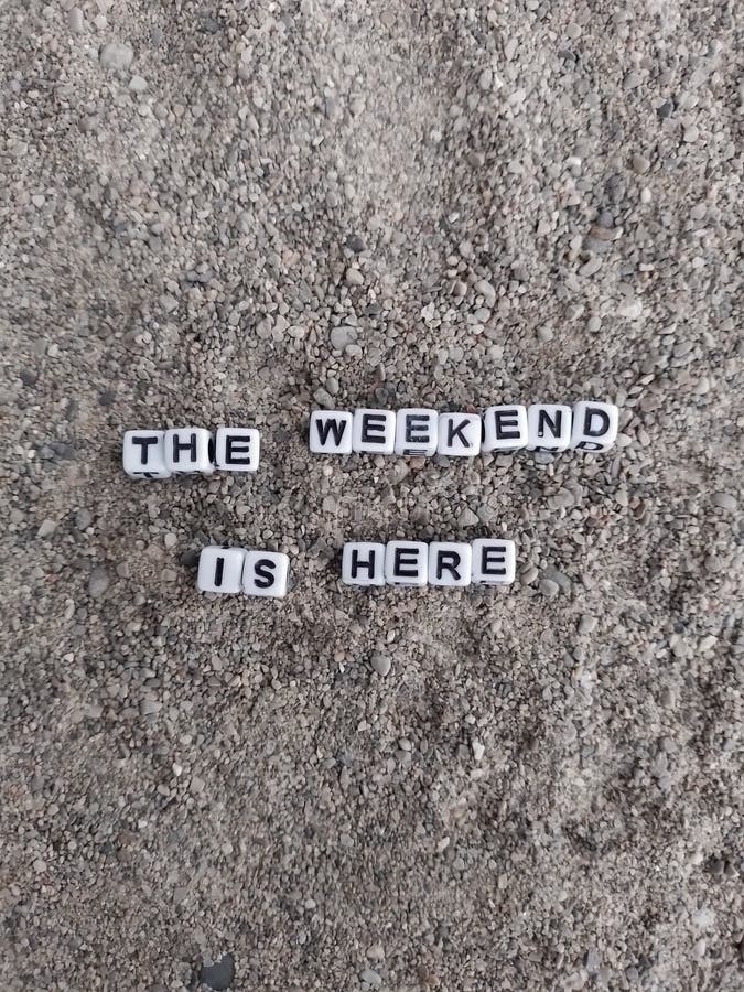 The Weekend is Here Written on Sand at the Beach Stock Photo - Image of ...