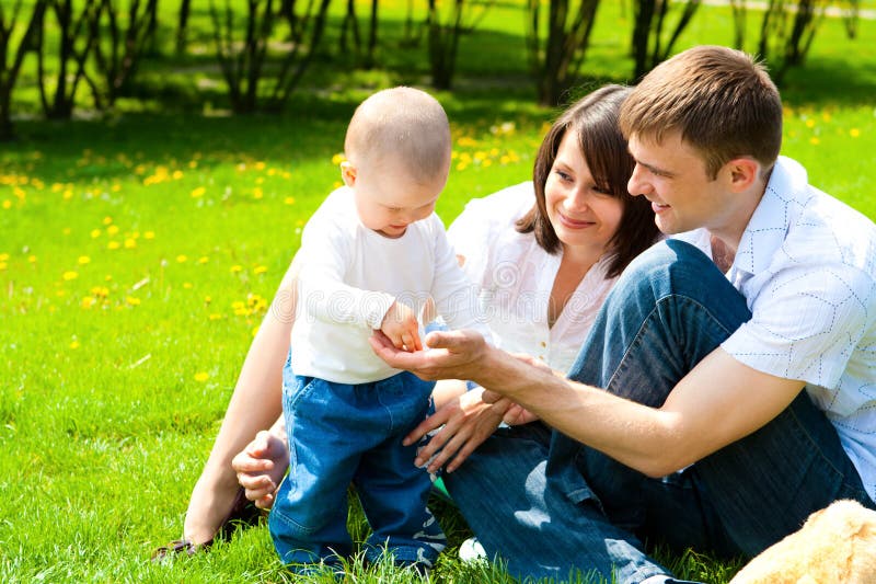 Weekend in park stock image. Image of child, parents - 13285793