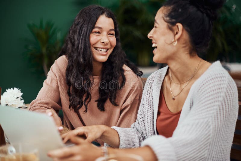 Weekends are Reserved for Get Togethers. Young Sisters Using a Digital ...
