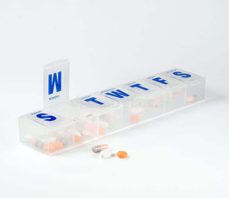 Weekly Pill Box stock photo. Image of medicine, heart - 13510914