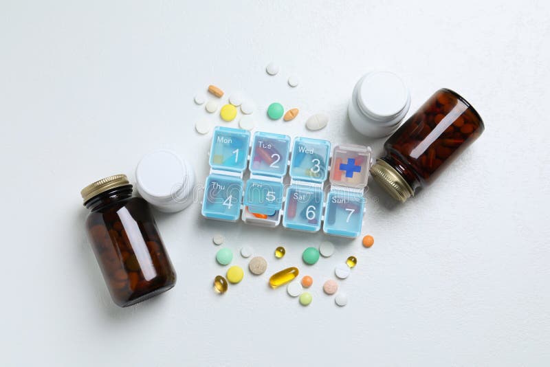 Weekly Pill Box with Medicaments on White Table, Flat Lay Stock Image ...