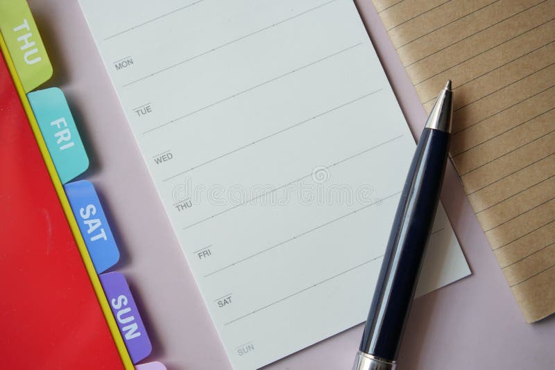 Weekly Planner and Notepad on Table Stock Image - Image of label ...