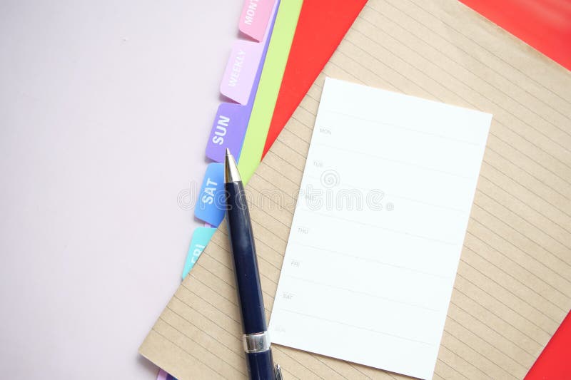 Weekly Planner and Notepad on Table Stock Photo - Image of horizontal ...