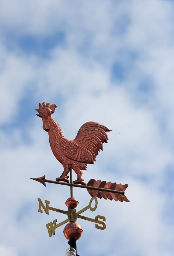 Weerhaan en TV antene stock afbeelding. Image of wind - 7054793