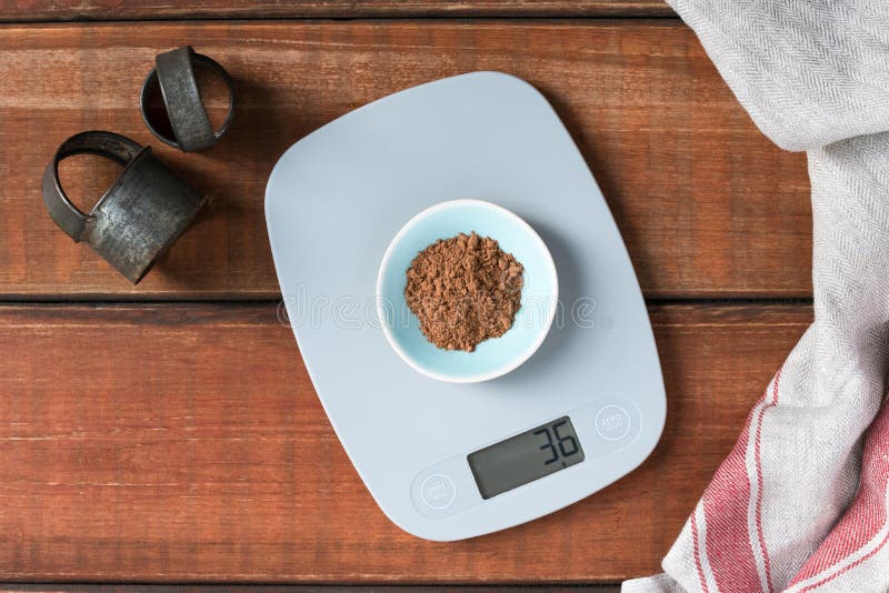 Weighing Cocoa Powder on a Digital Scale Stock Image - Image of food ...