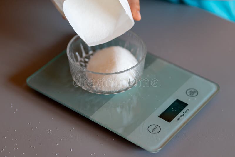 Weighing Sugar from a Pack on a Kitchen Scale Stock Photo - Image of ...