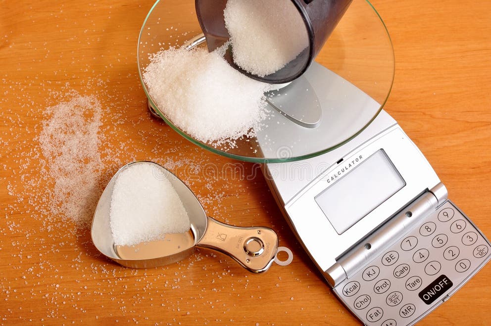 Weighing sugar on scale. stock photo. Image of meal, numbers - 16504782