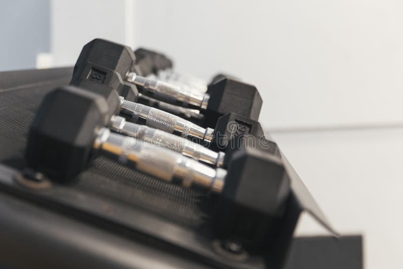 Bench with 4 small weights stock image. Image of muscular - 258550743