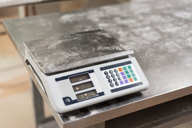 Weight scale in the bakery stock photo. Image of pastry - 130481088
