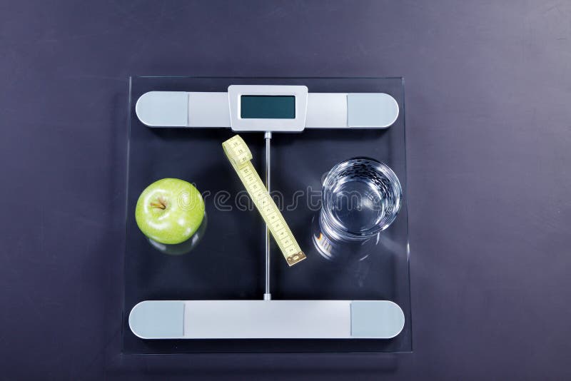 Weight scales with water stock photo. Image of calories - 40172846