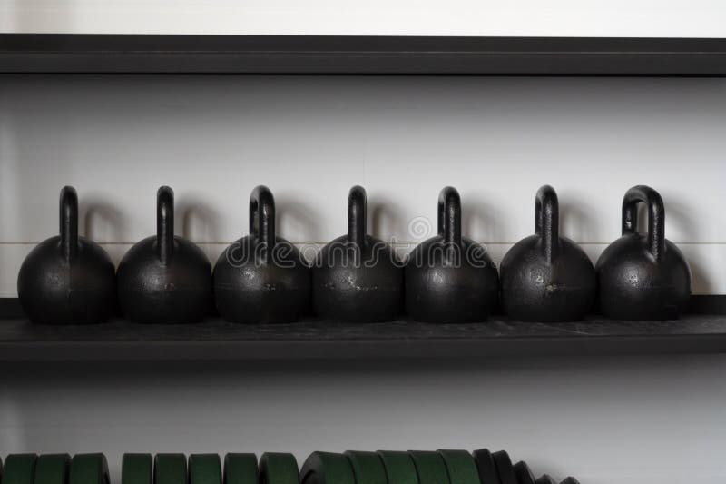 The weights are in a row stock image. Image of healthy - 377475433