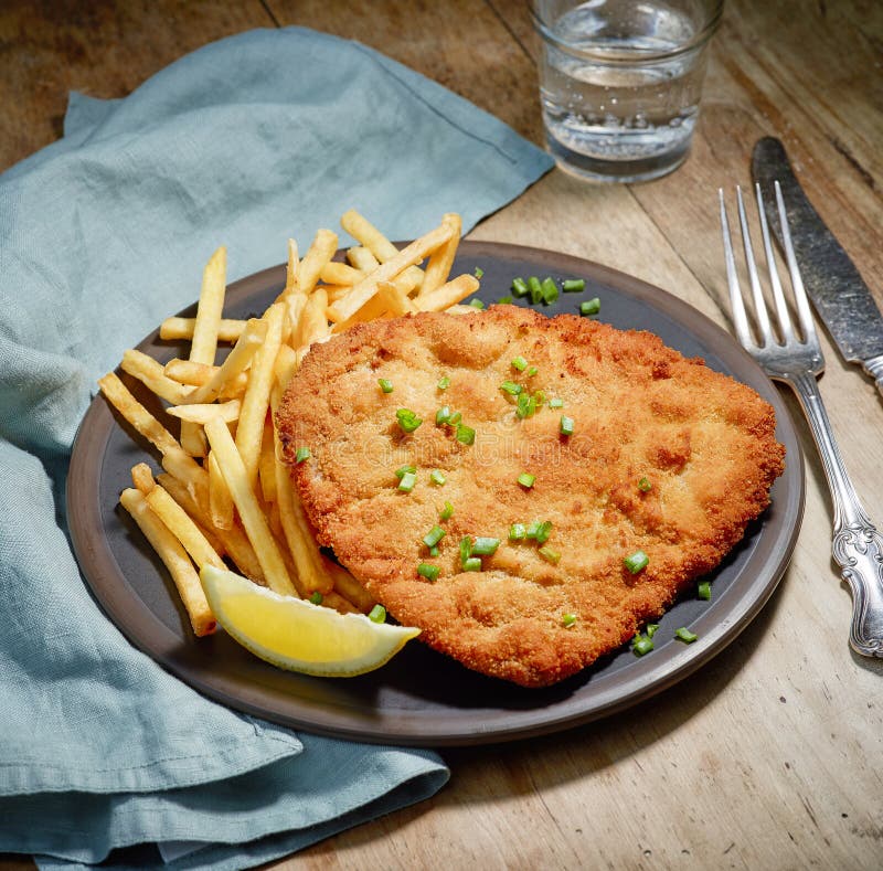 Weiner Schnitzel with Fried Potatoes Stock Photo - Image of german ...