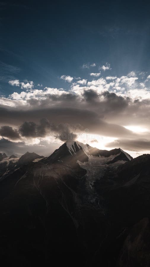 The Weisshorn Illuminated by Dramatic Spring Sunlight and Clouds in the ...